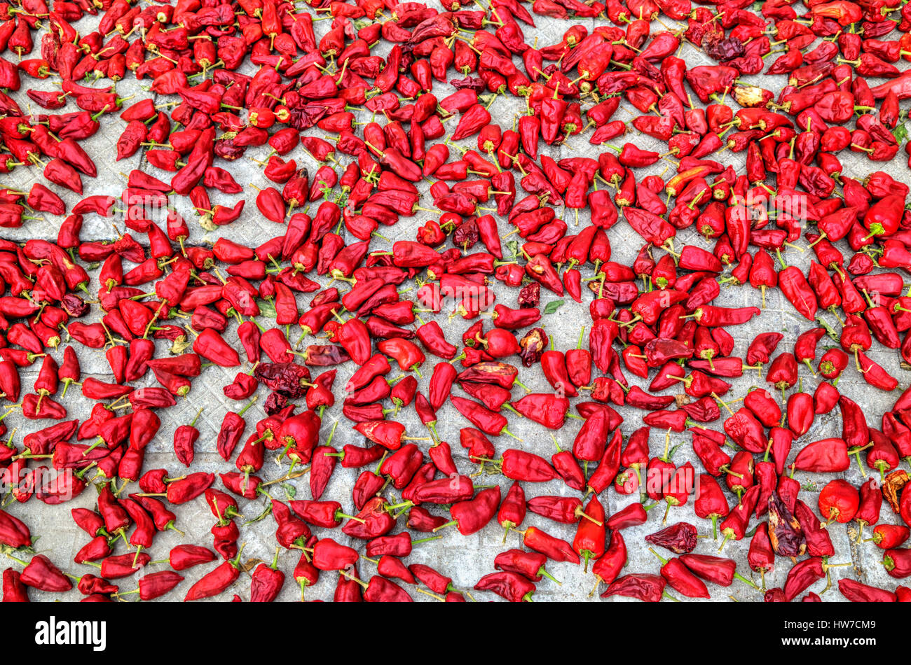 Drying red pepper background Stock Photo - Alamy