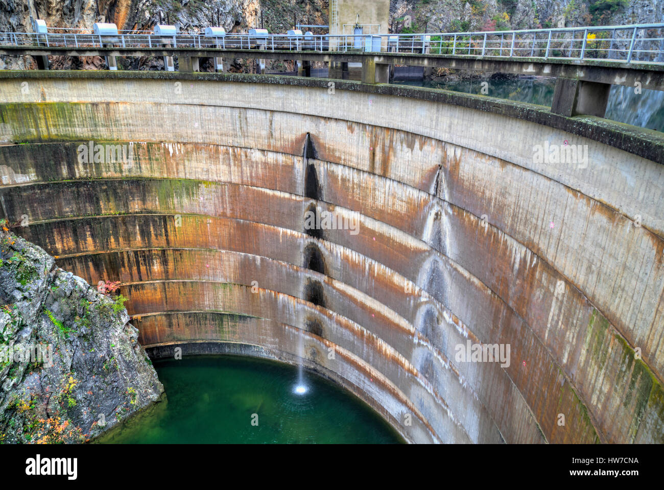 Water falls from the dam of hydroelectric power plant Stock Photo - Alamy