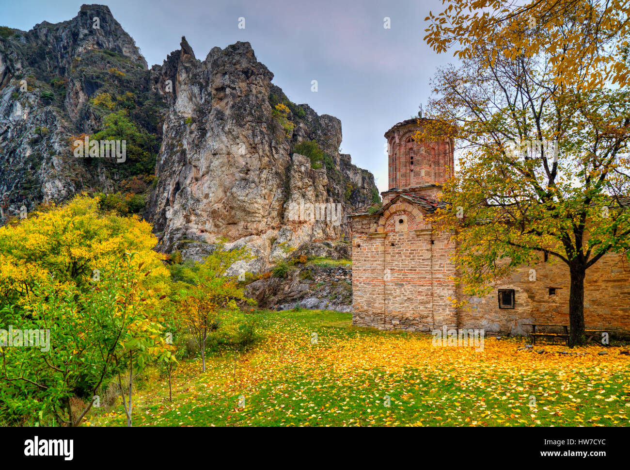 Beautiful landscape with church in the mountain and colorful autumn ...