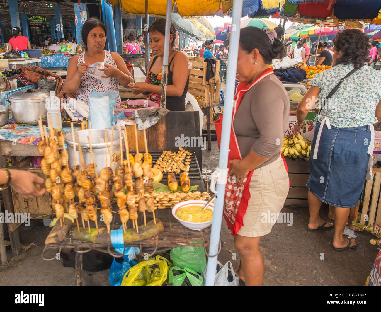 Baked worms. Delicacy of the local inhabitants Stock Photo - Alamy
