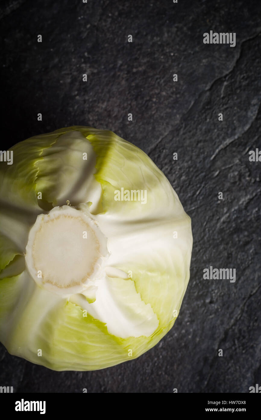 Cabbage on a black stone background. Place for the text Stock Photo - Alamy