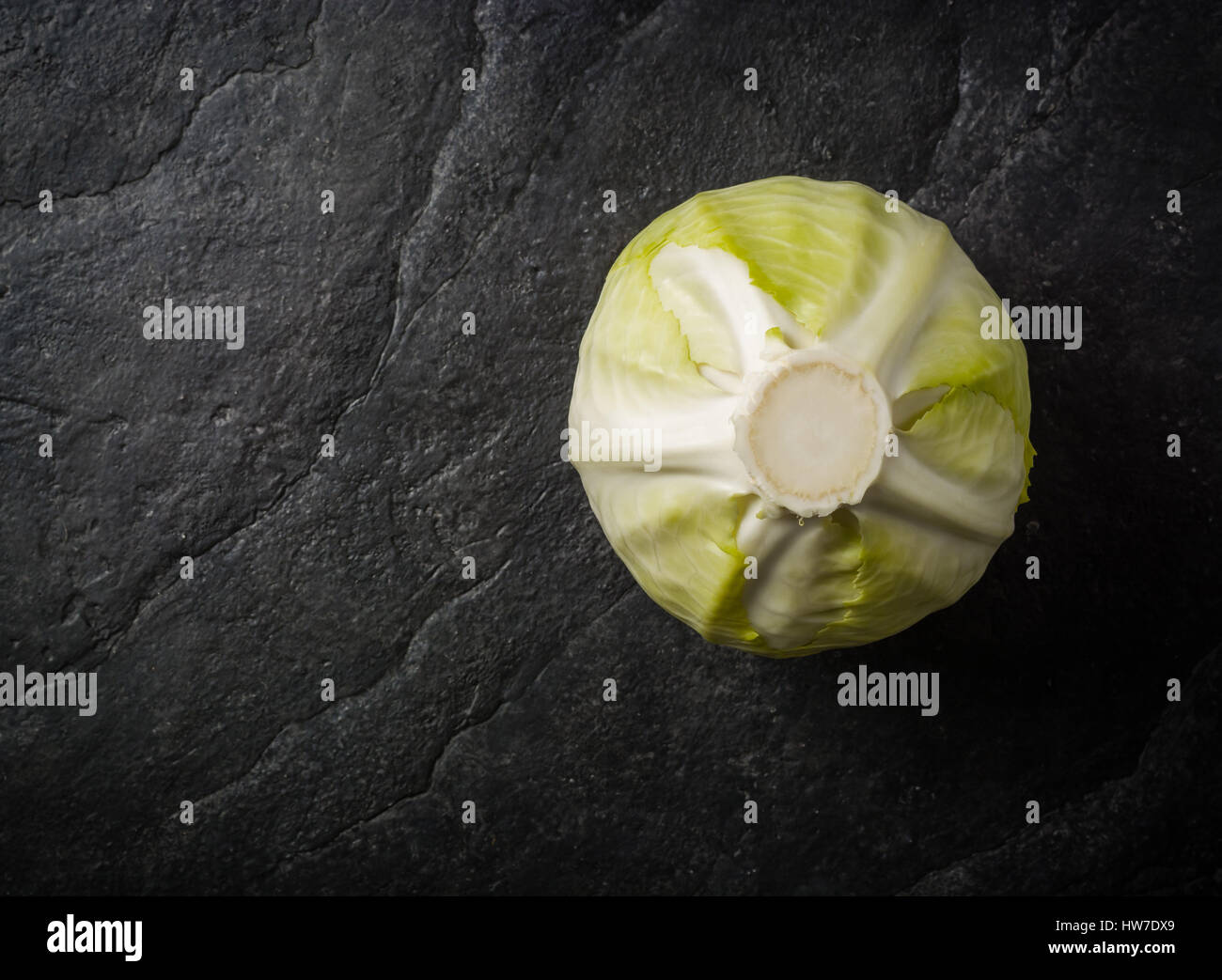 Cabbage on a black stone background. Place for the text Stock Photo - Alamy