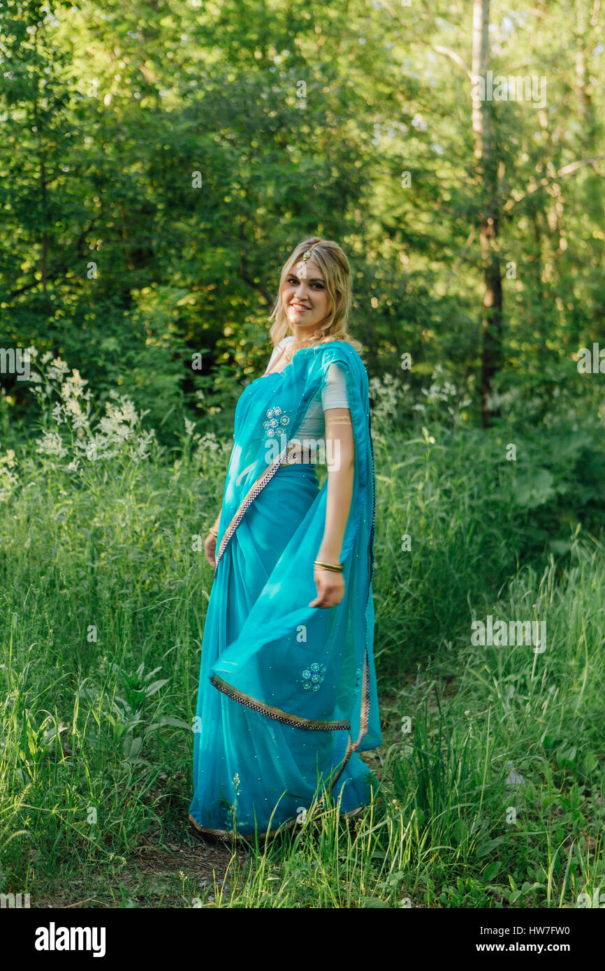 Beautiful european woman in traditional indian sari in the forest Stock ...