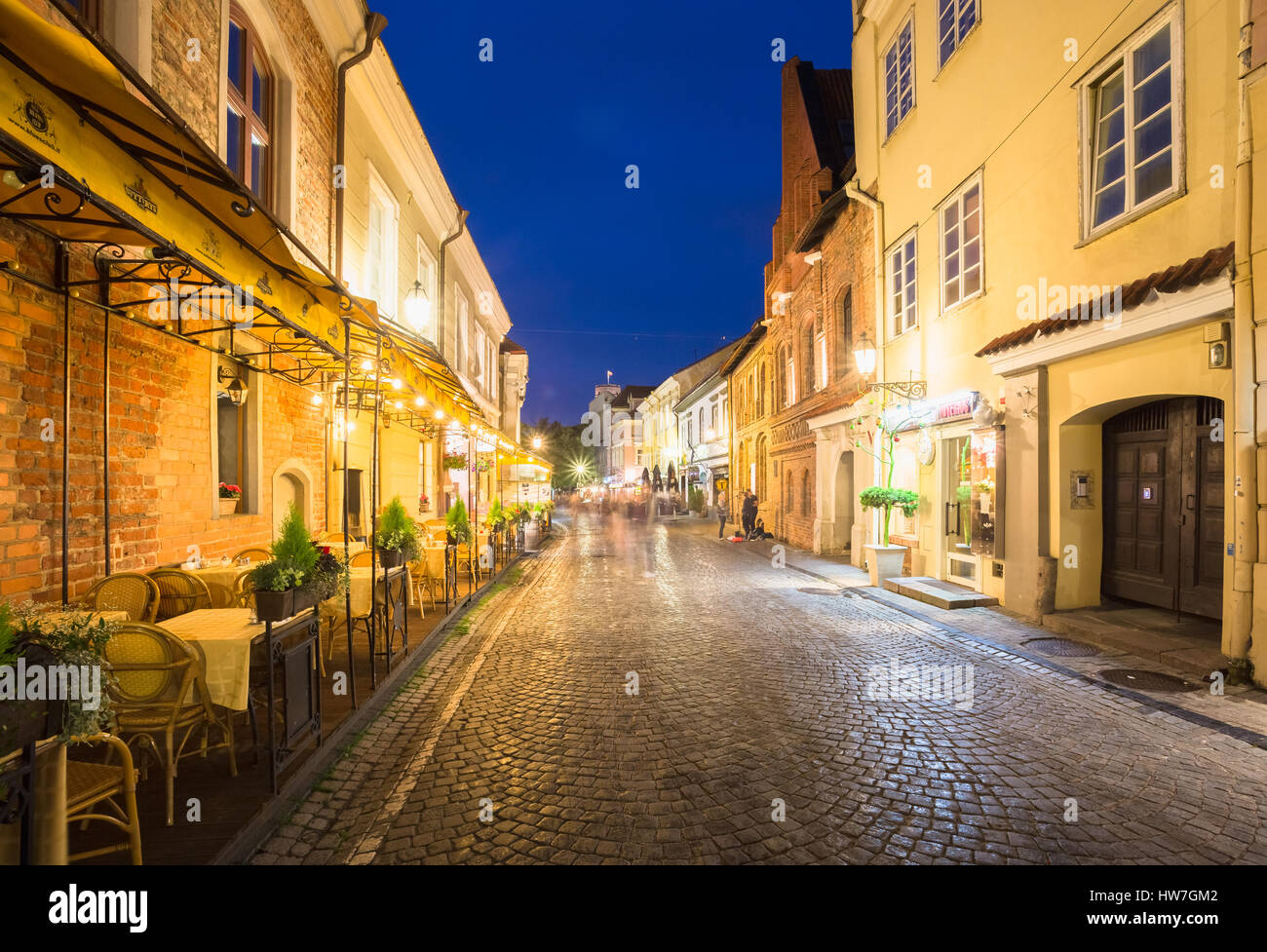 Vilnius, Lithuania. Illuminated Cobbled Pilies Street Of Old Town In ...