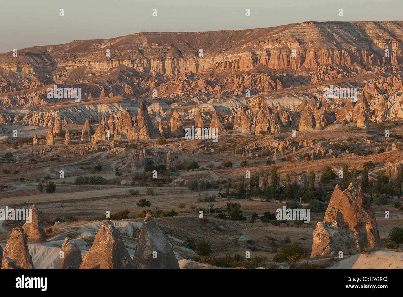 Cappadocia spires and caves at sunset, Turkey Stock Photo - Alamy