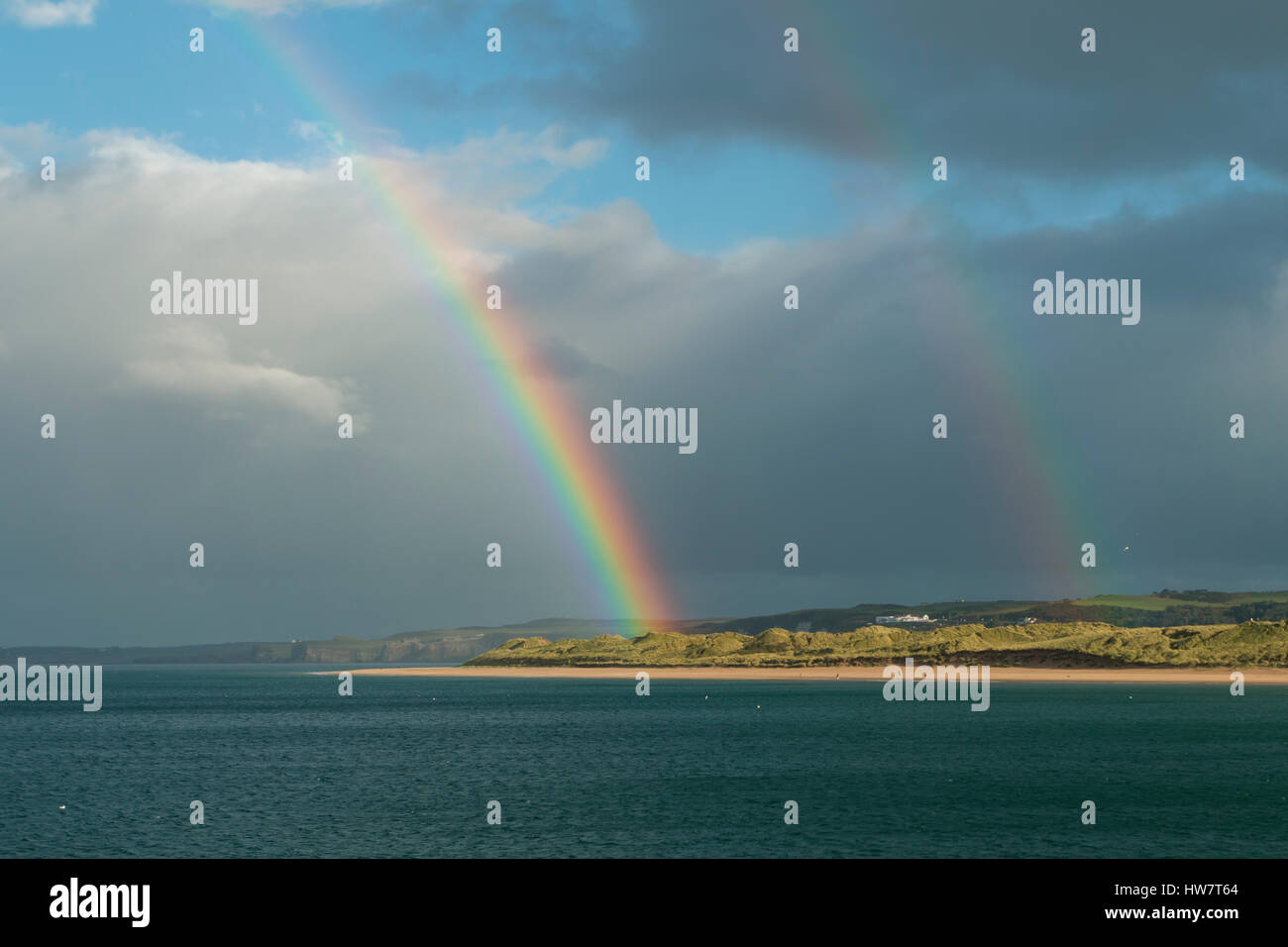 Double rainbow over the sand dunes in Portrush, Northern Ireland Stock ...