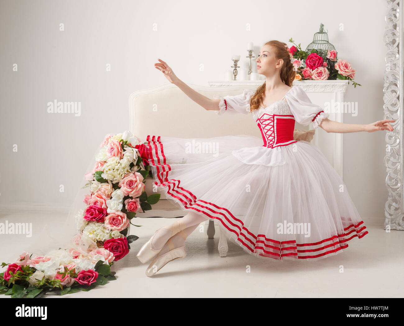Cute Ballerina In Stage Costume Next To Bouquets Of Spring Flowers