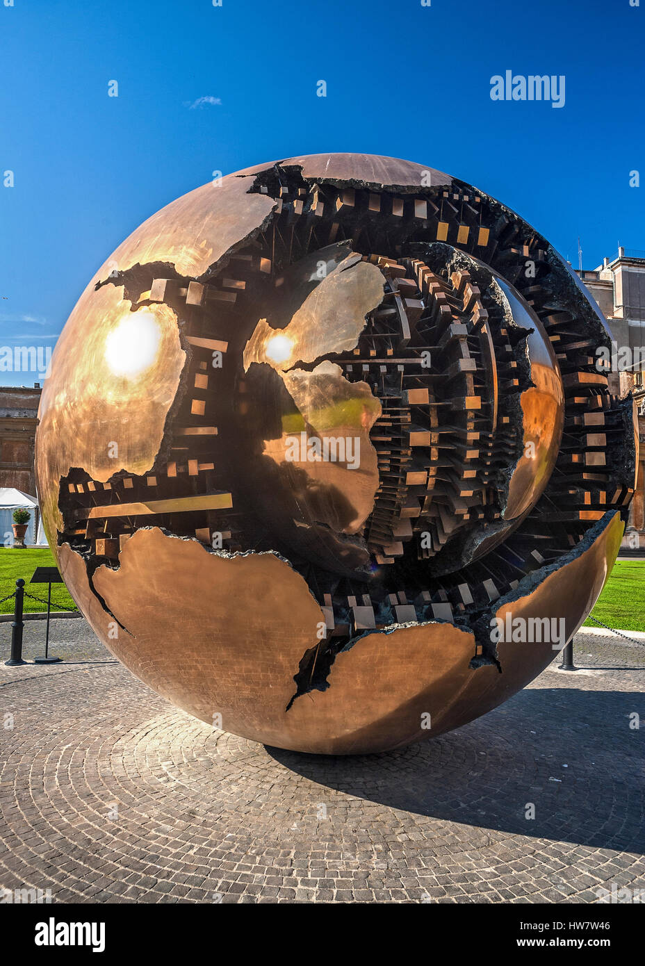 The structure titled Sphere within a Sphere, is a bronze statue stands ...