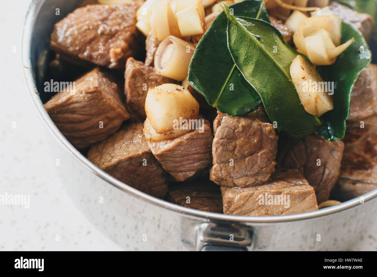 braised beef in pot on table Stock Photo - Alamy