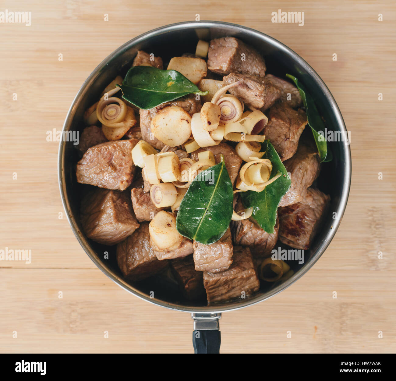 braised beef in pot on table Stock Photo - Alamy