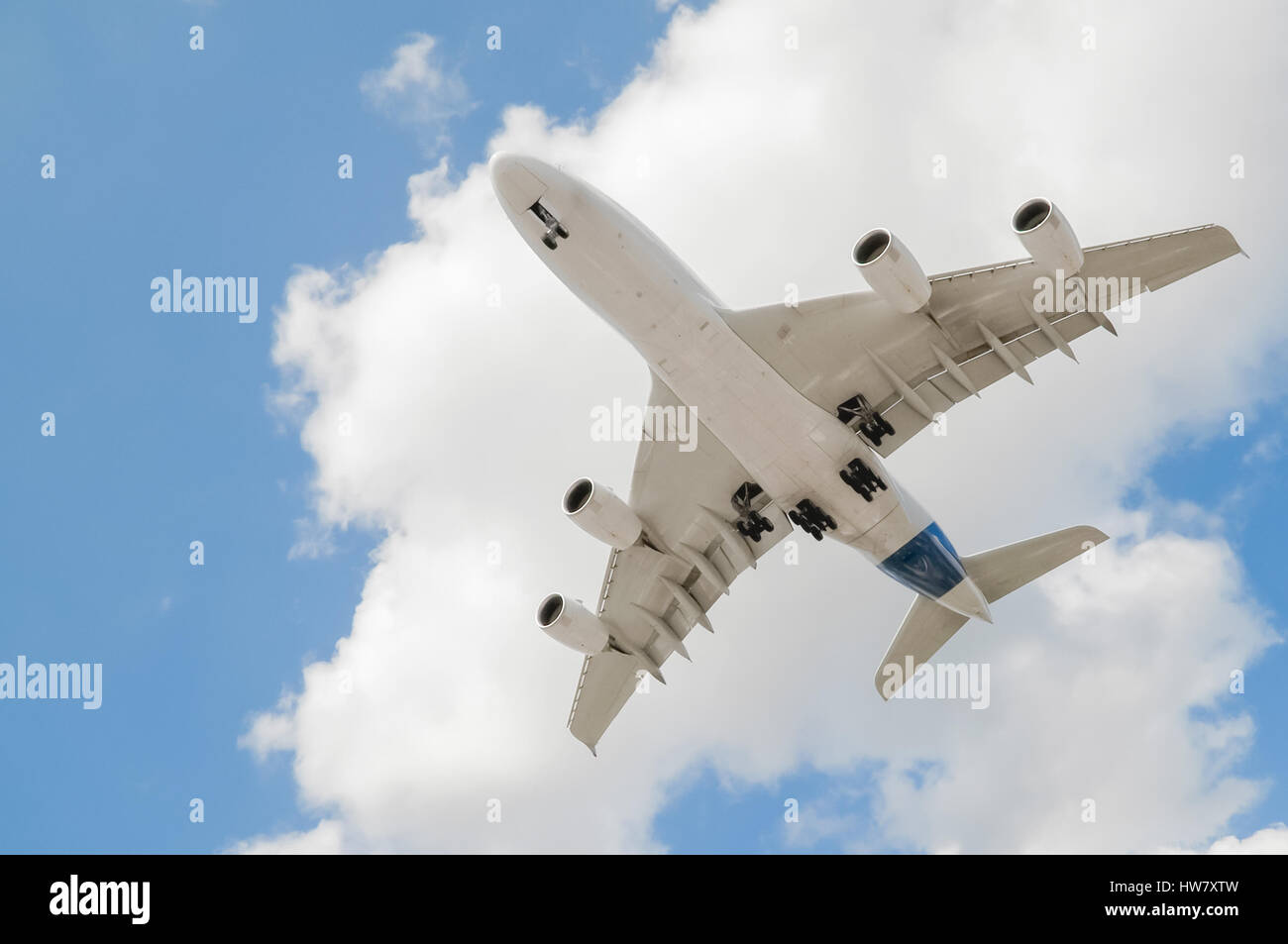 large passenger jet on landing approach to an airport Stock Photo - Alamy