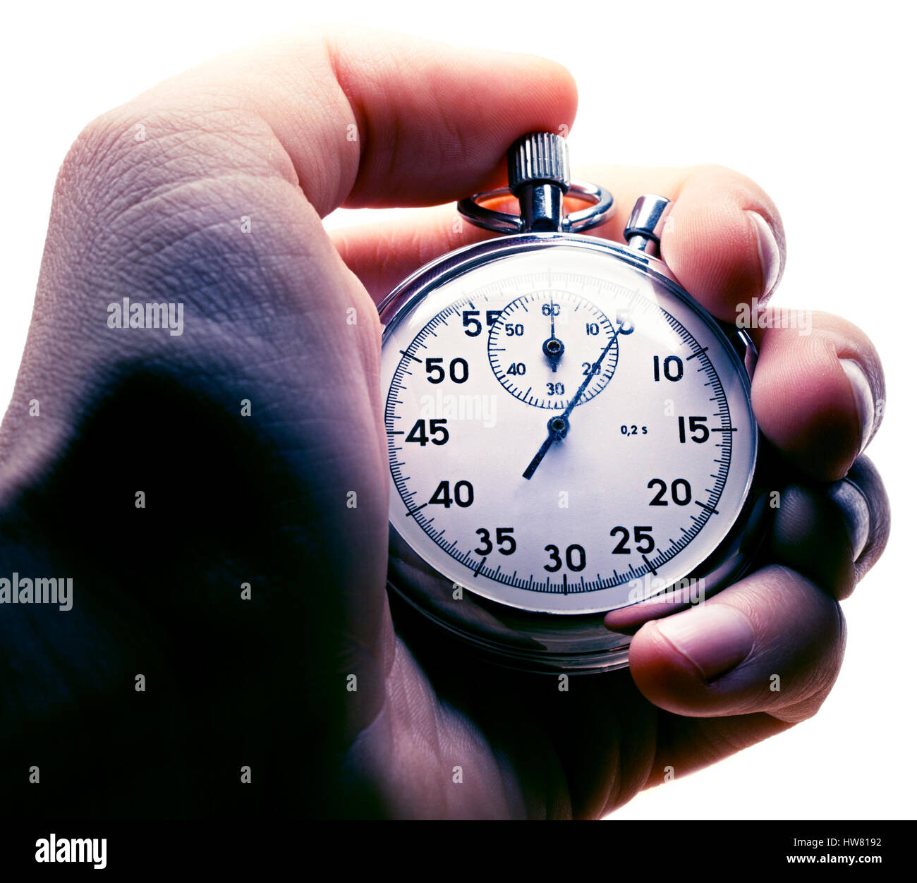 Male hand holding stopwatch on white in closeup Stock Photo - Alamy
