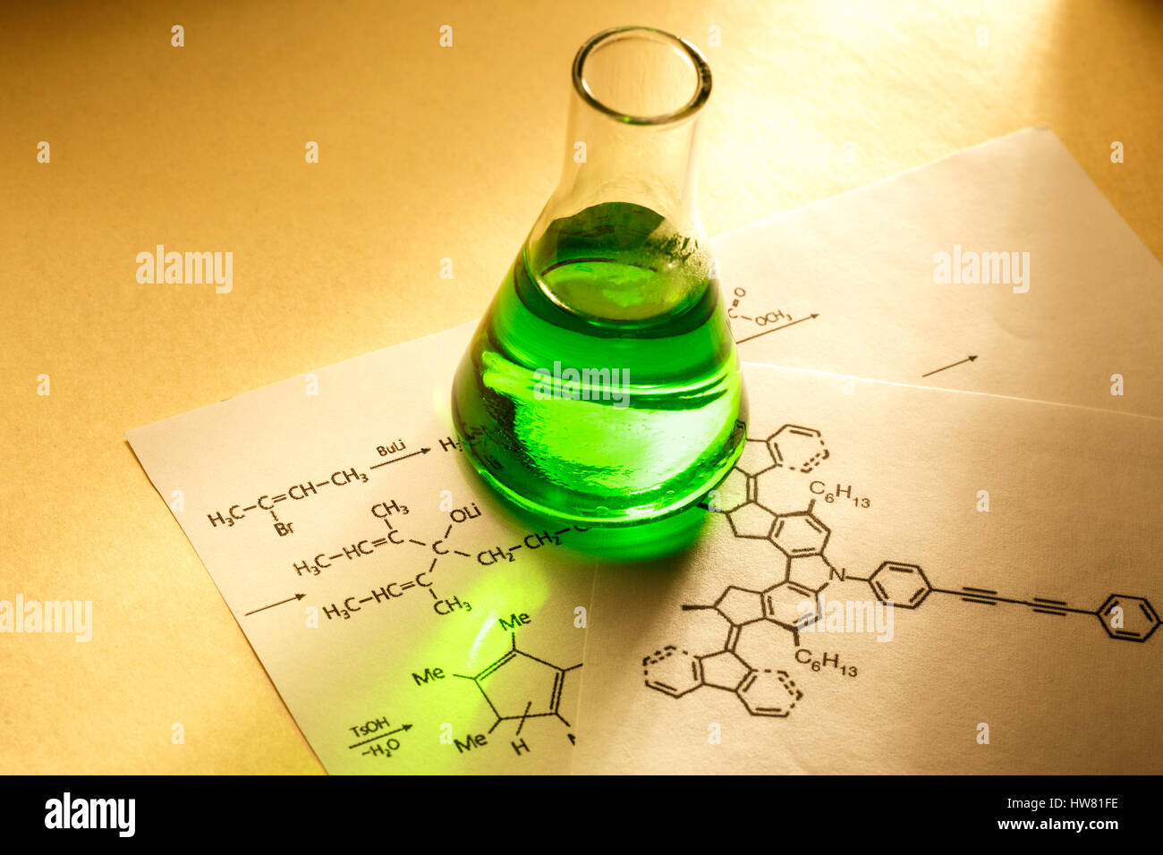Chemical tube with reaction formula in light Stock Photo - Alamy