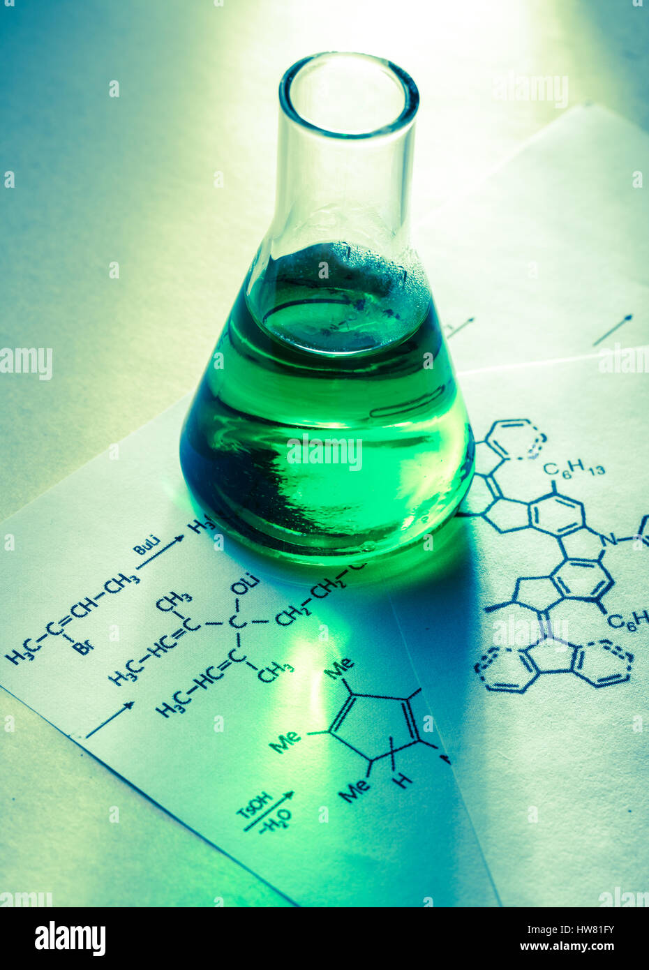 Chemical tube with reaction formula in light Stock Photo - Alamy