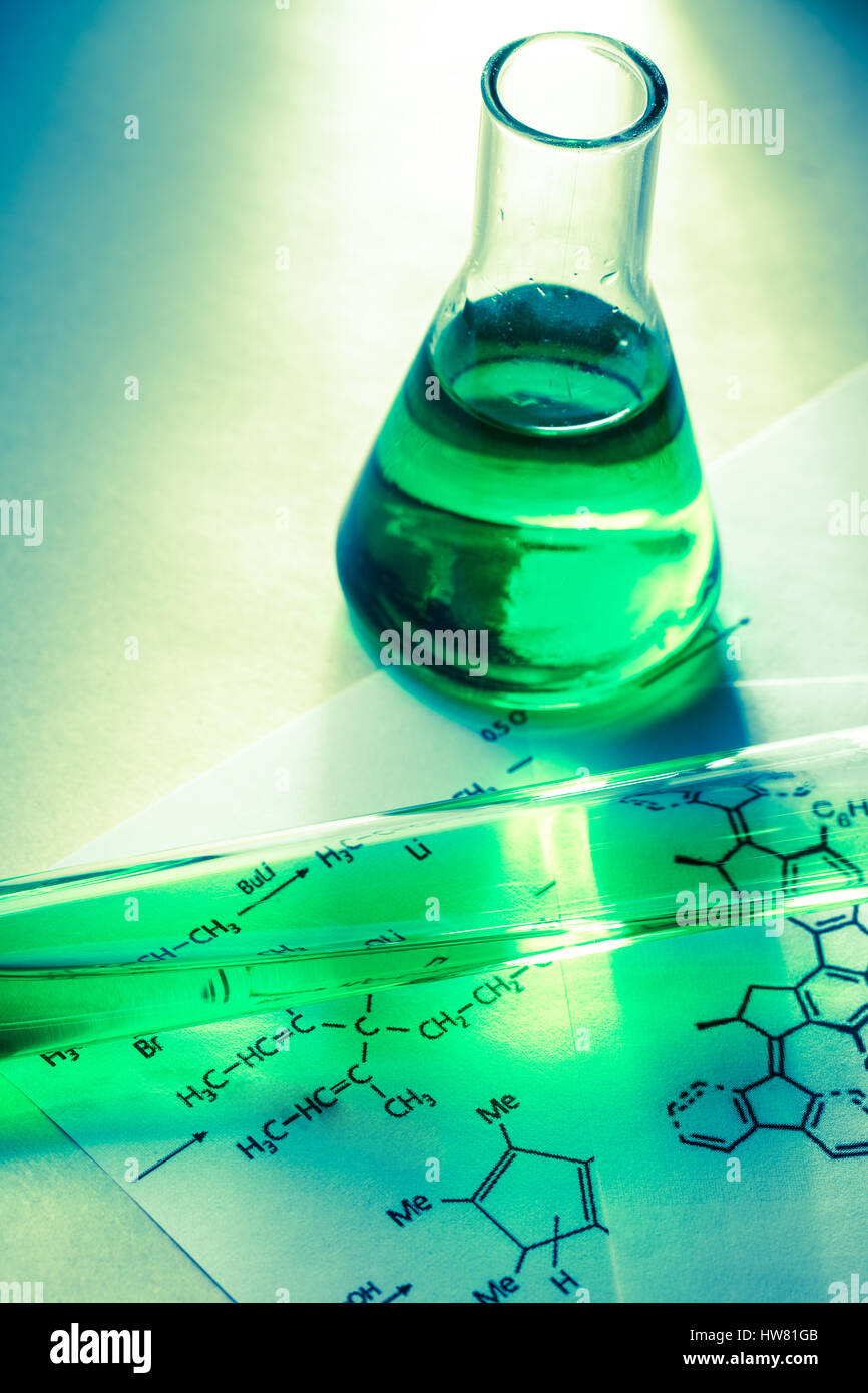 Chemical tubes with reaction formula in light Stock Photo - Alamy