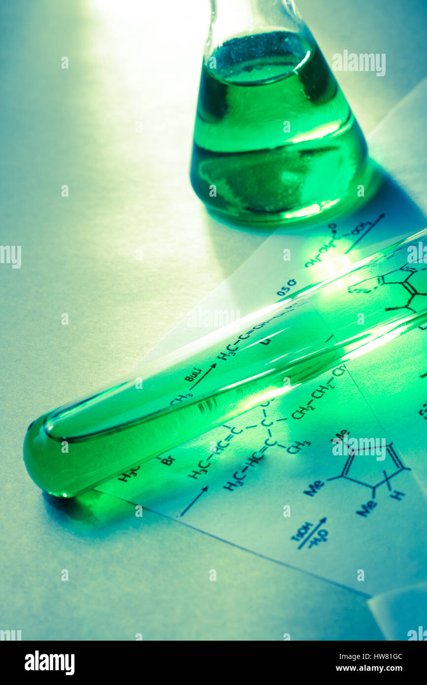 Chemical tubes with reaction formula in light Stock Photo - Alamy