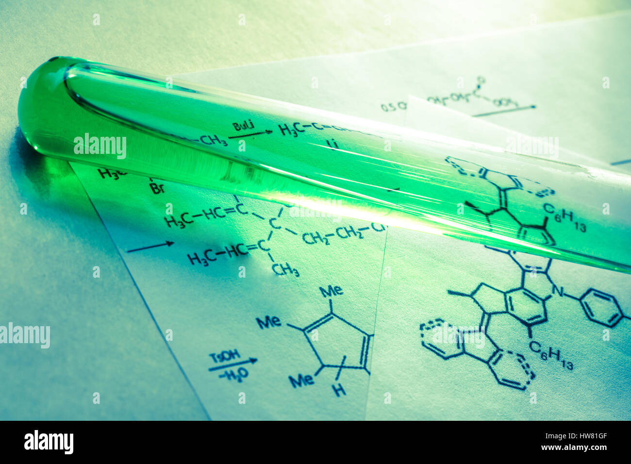 Chemical tube with reaction formula in light Stock Photo - Alamy