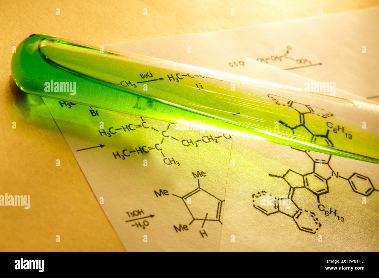 Chemical tube with reaction formula in light Stock Photo - Alamy