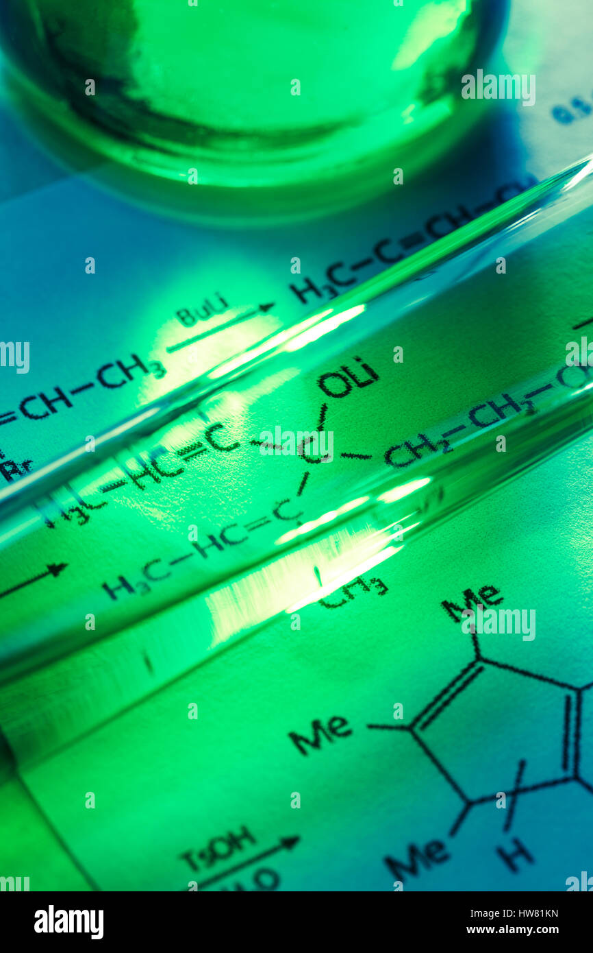 Chemical tubes with reaction formula in light Stock Photo - Alamy