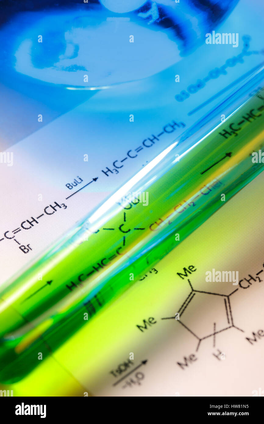 Chemical tubes with reaction formula in light Stock Photo - Alamy