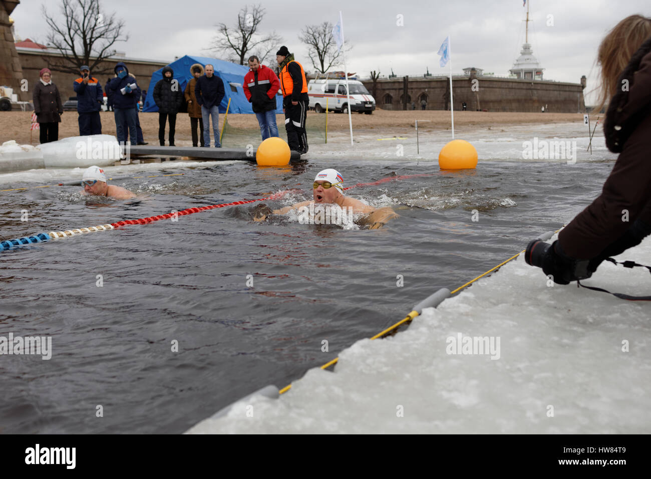St. Petersburg, Russia, 18th March, 2017. People participate in a swim ...