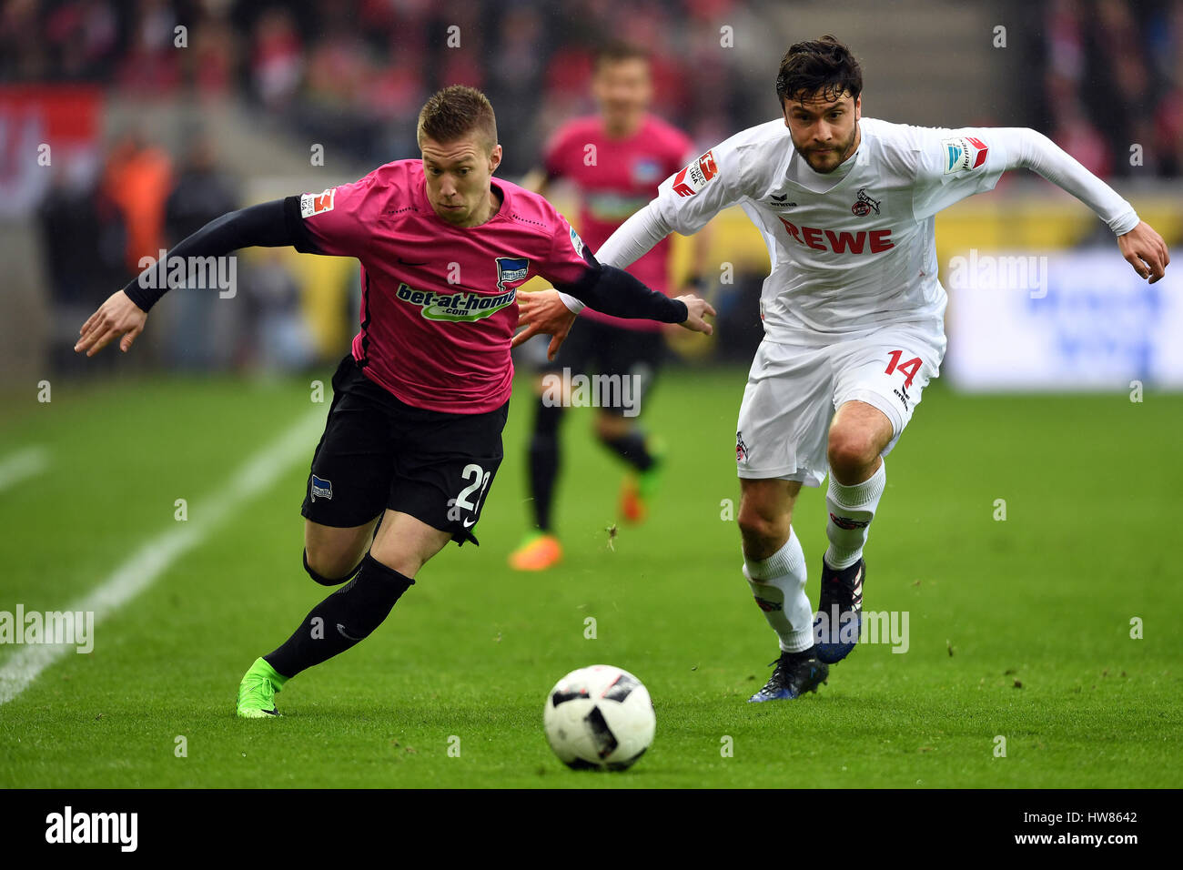 Cologne's Jonas Hector (r) and Berlin's Mitchell Weiser in action ...