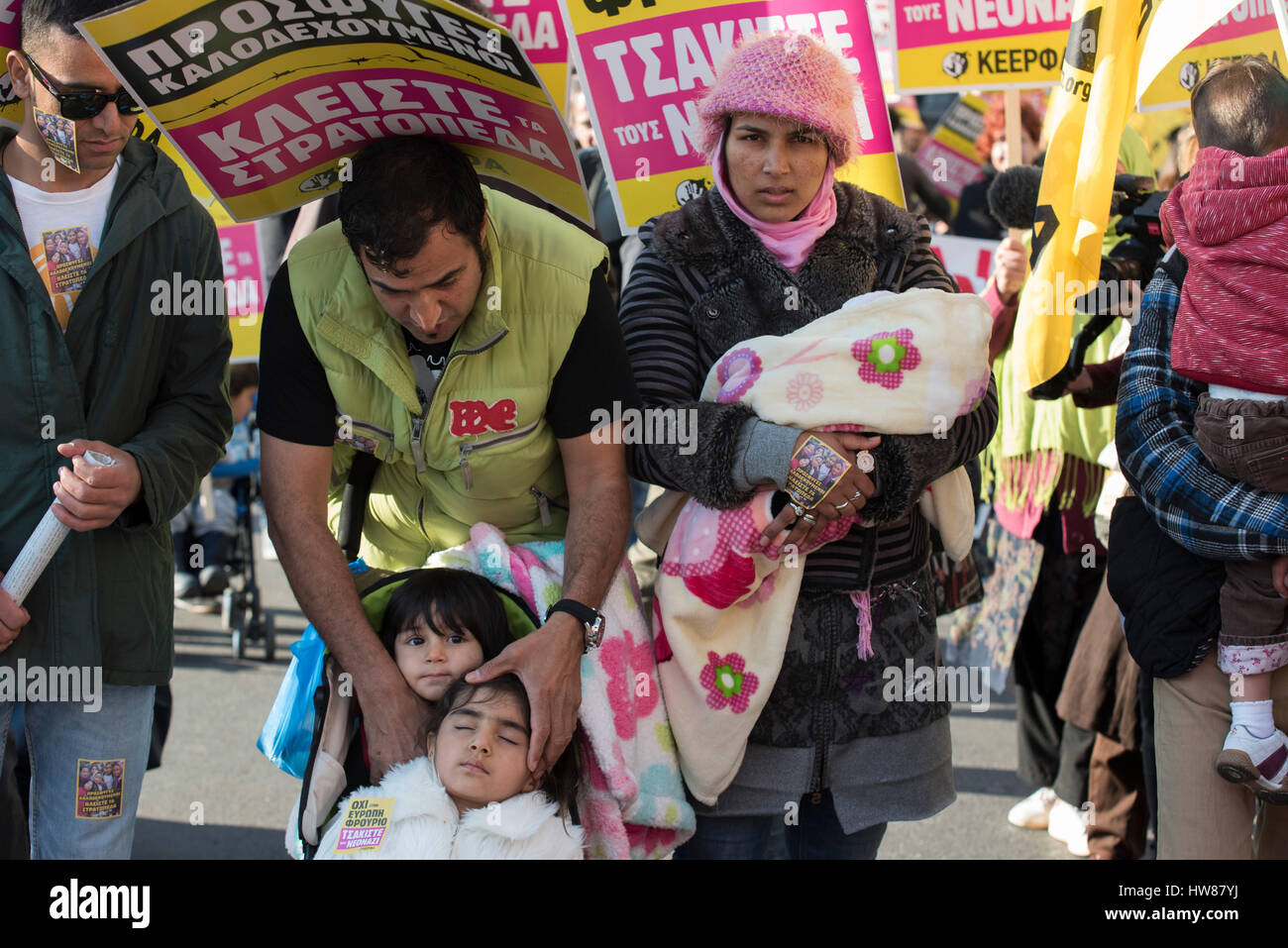 Activists hold placards slogans hi-res stock photography and images - Alamy