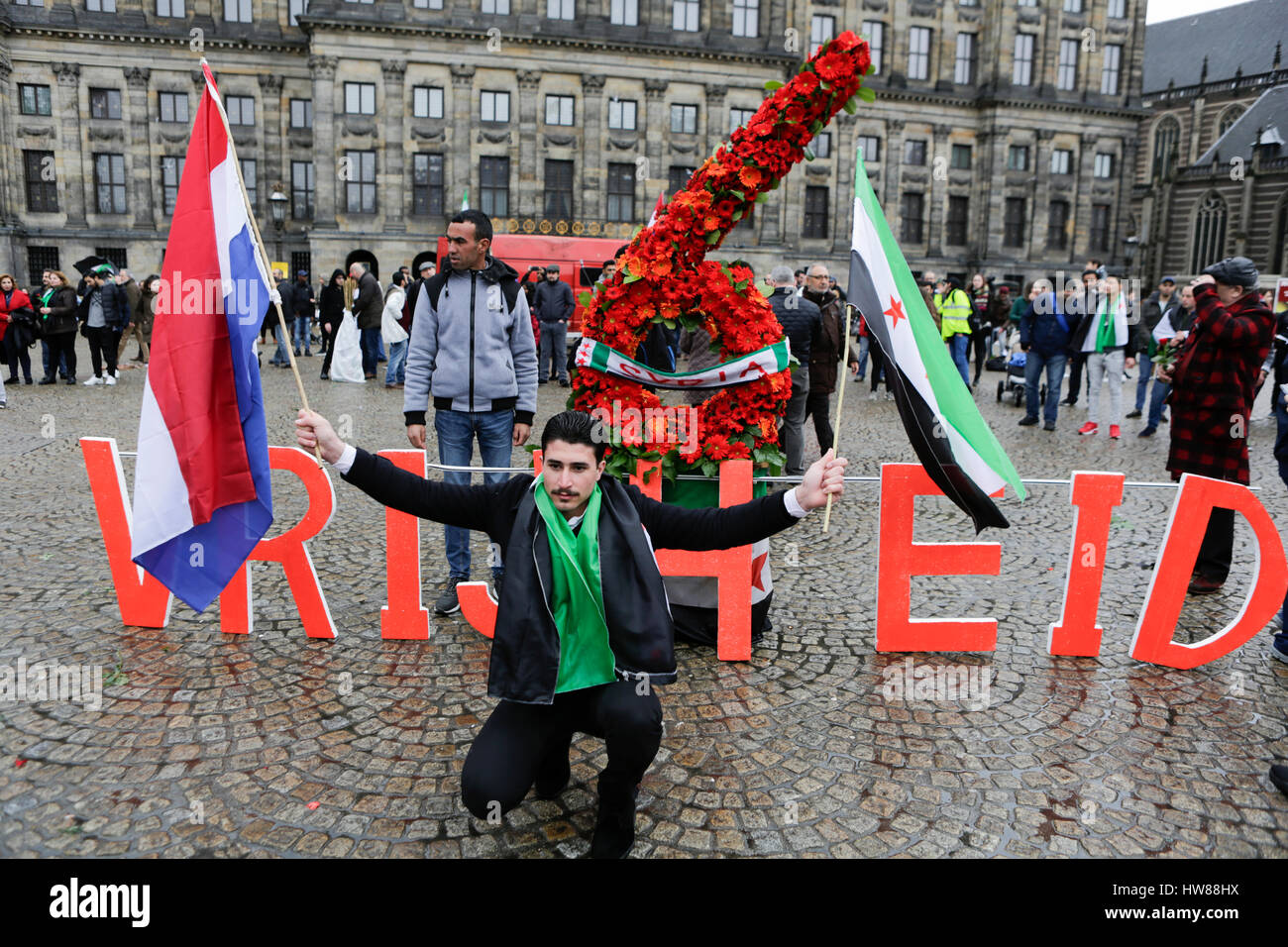 Amsterdam, Netherlands. 18th March 2017. Syrians pose with a Dutch and ...