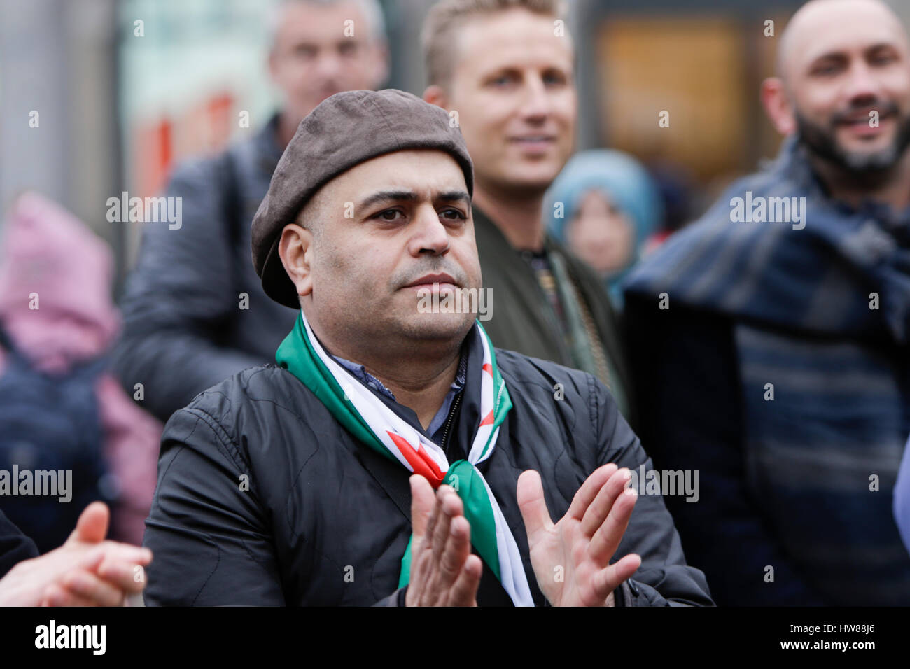 Amsterdam, Netherlands. 18th March 2017. A Syrian claps his hands ...