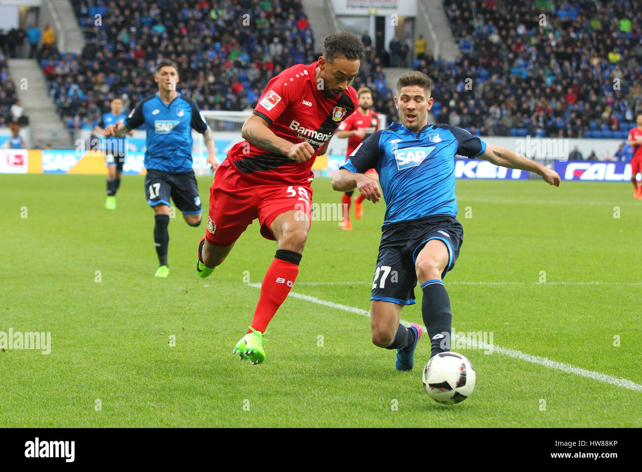 Sinsheim, Germany. 18th Mar, 2017. Leverkusen's Benjamin Henrichs (l ...