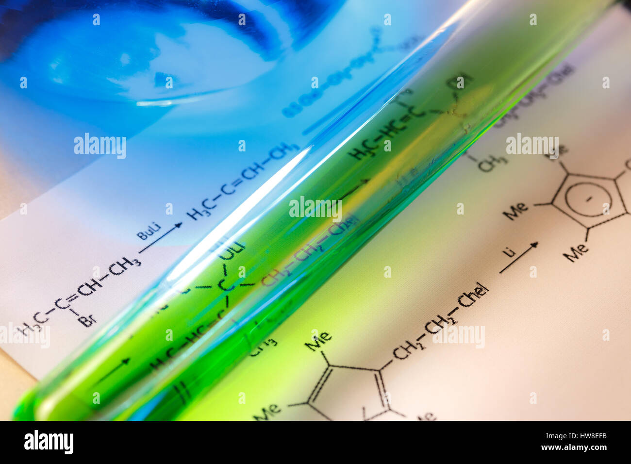 Chemical tubes with reaction formula in light Stock Photo - Alamy