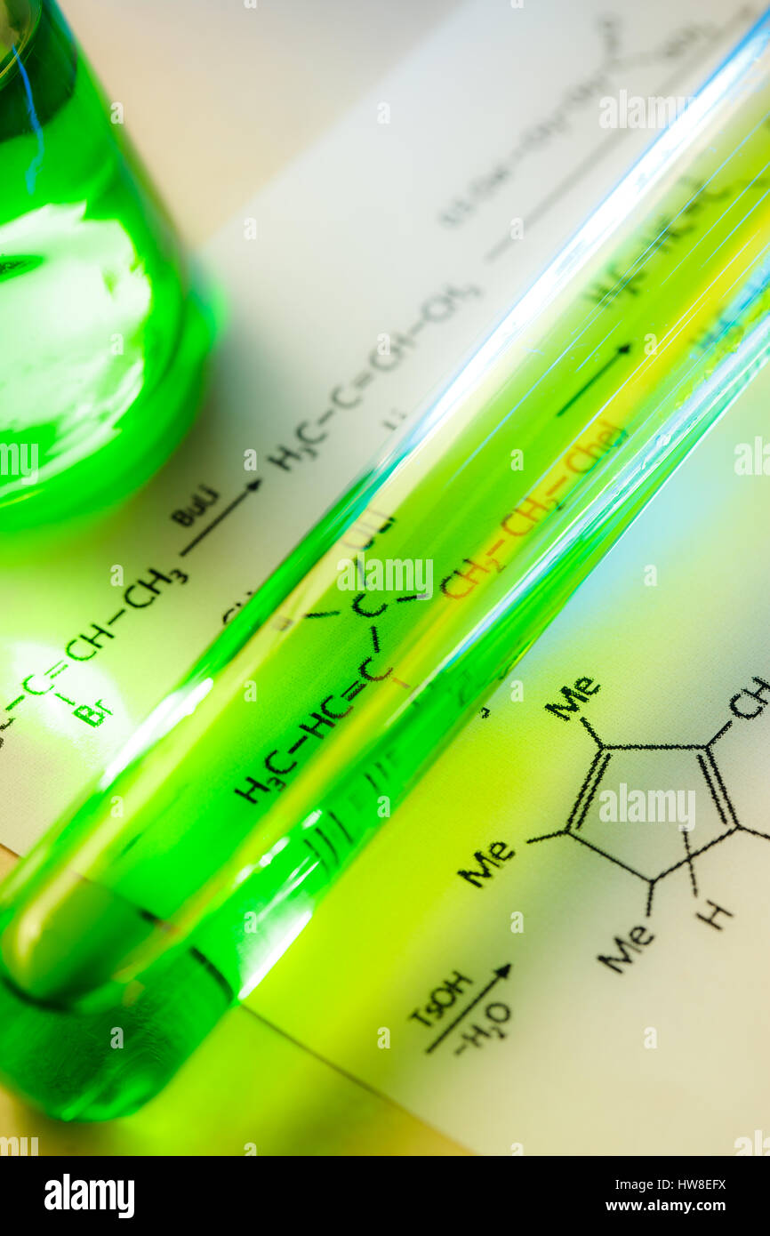 Chemical tubes with reaction formula in light Stock Photo - Alamy