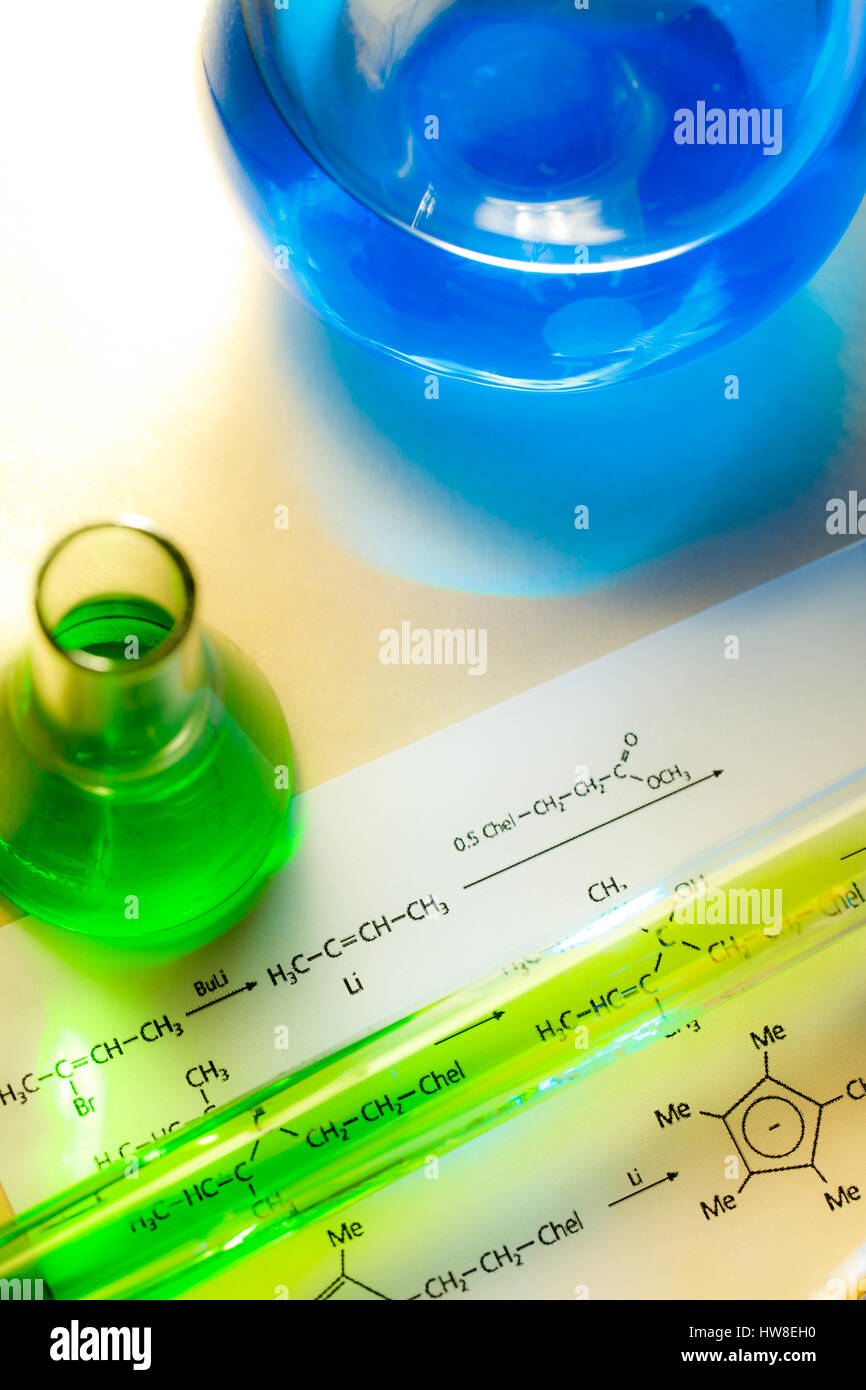 Chemical tubes with reaction formula in light Stock Photo - Alamy