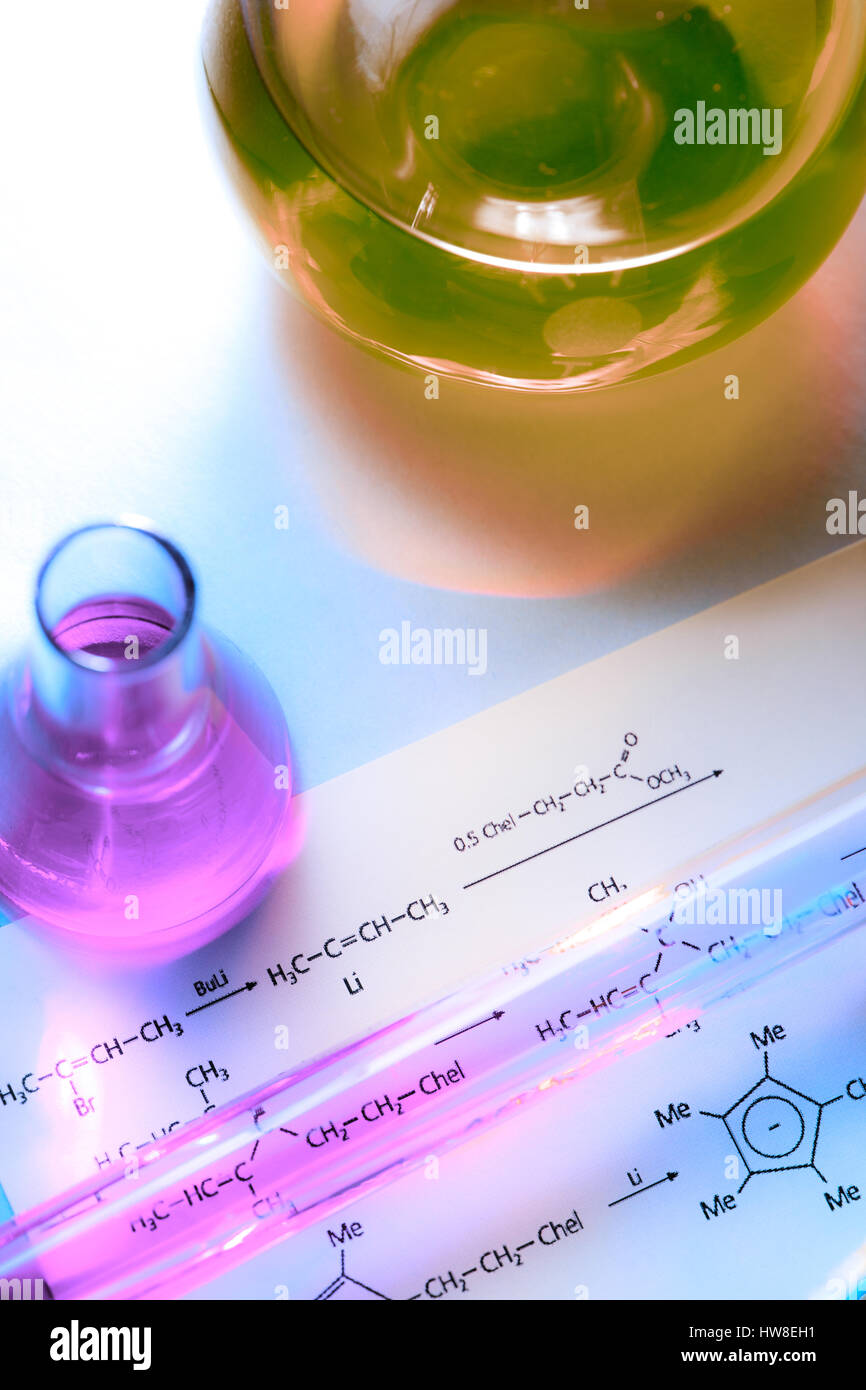 Chemical tubes with reaction formula in light Stock Photo - Alamy