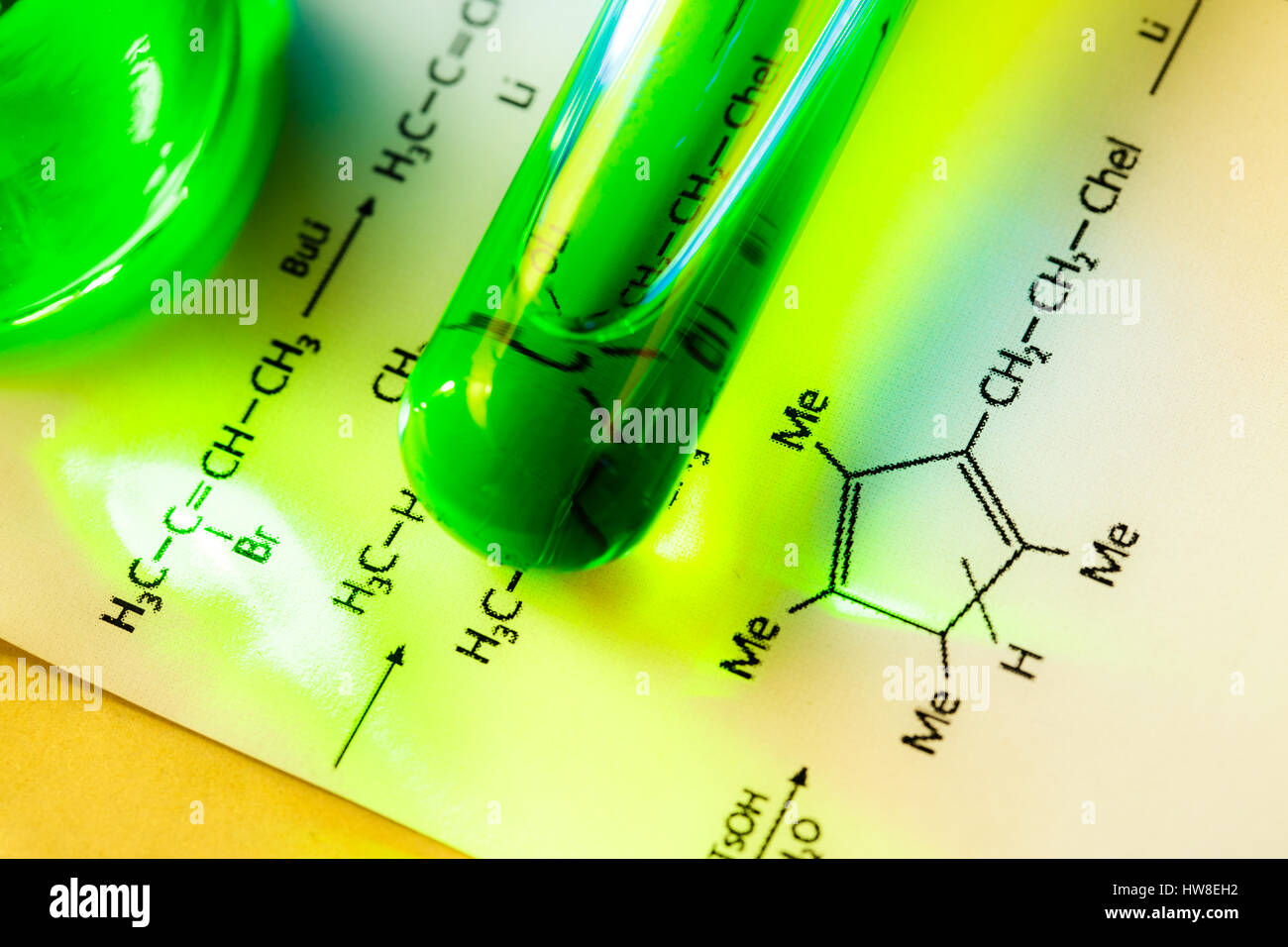Chemical tubes with reaction formula in light Stock Photo - Alamy