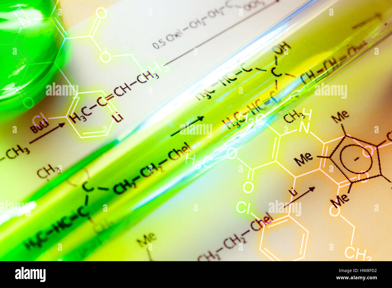 Chemical tube with reaction formula in light Stock Photo - Alamy