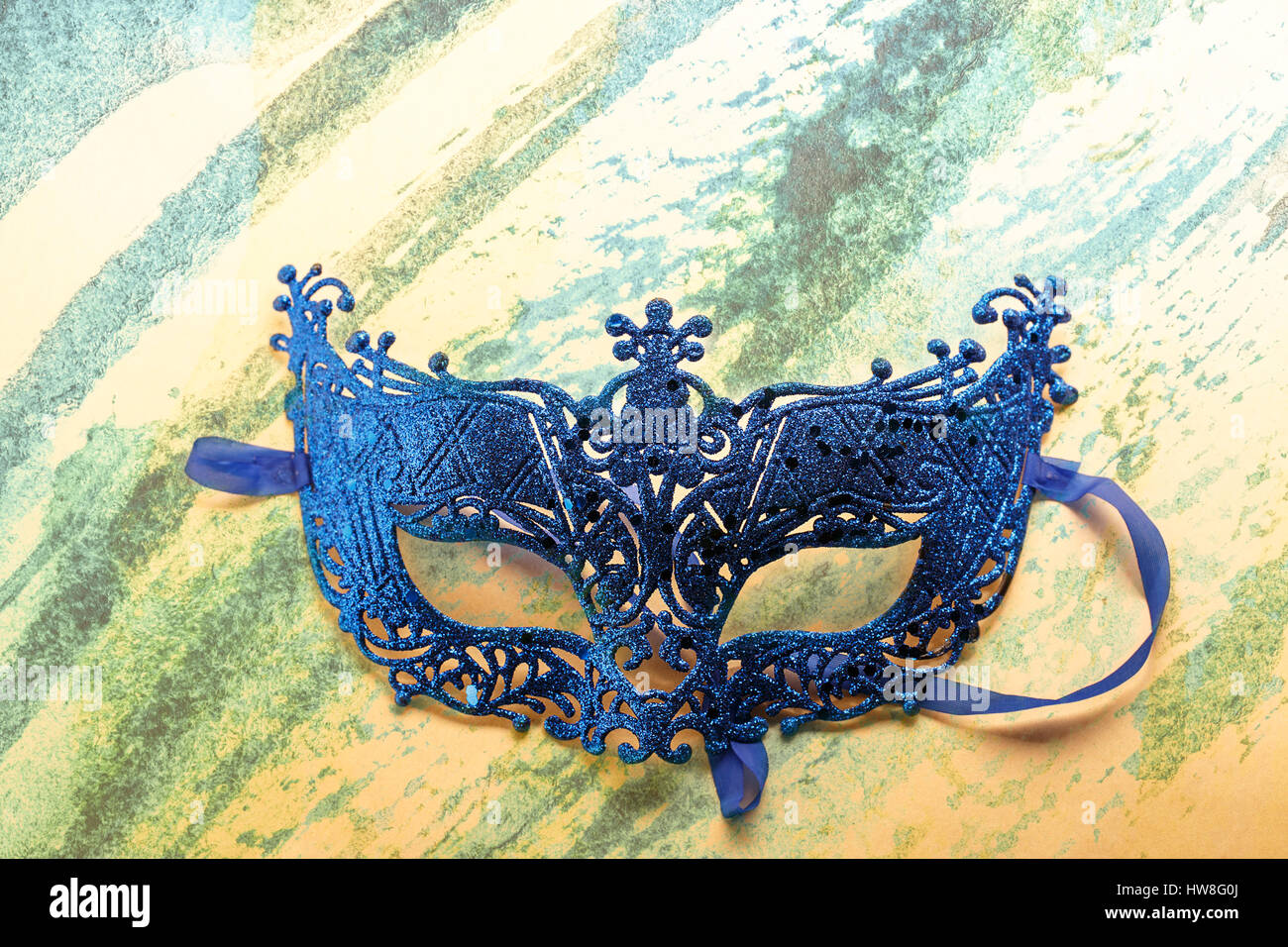 Single carnival disguise mask in close up Stock Photo - Alamy