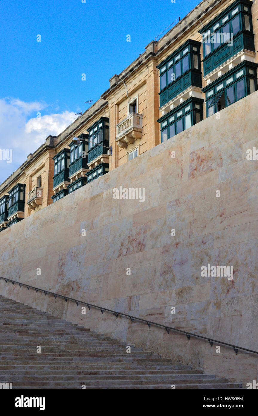 traditional Maltese buildings at the entrance to Valletta, with ...