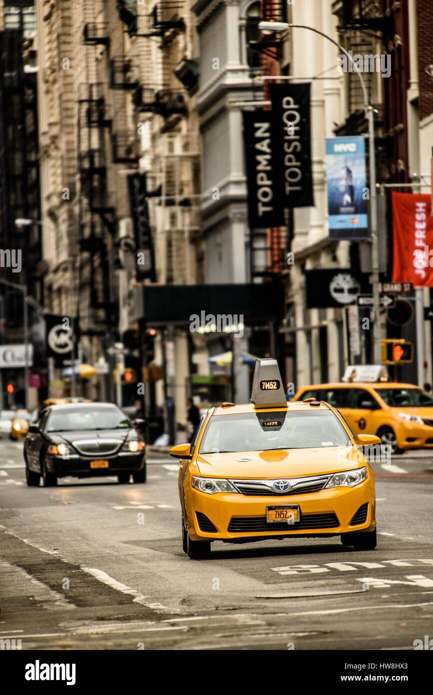 USA, New York, Manhattan, Yellow cab on one of New Yorks avenues Stock ...
