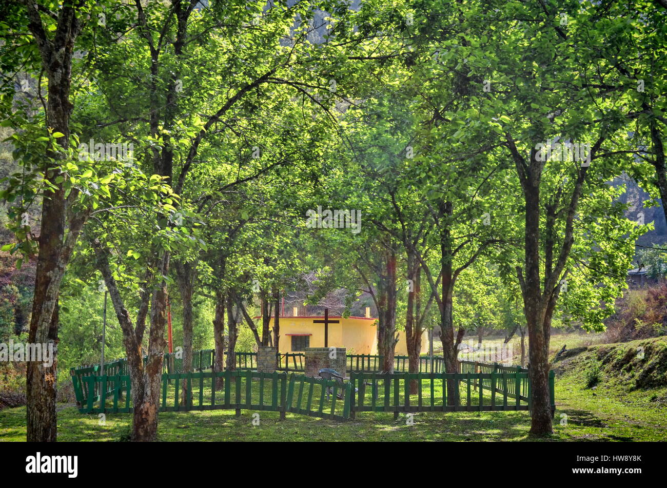 A church in a beautiful garden Stock Photo - Alamy