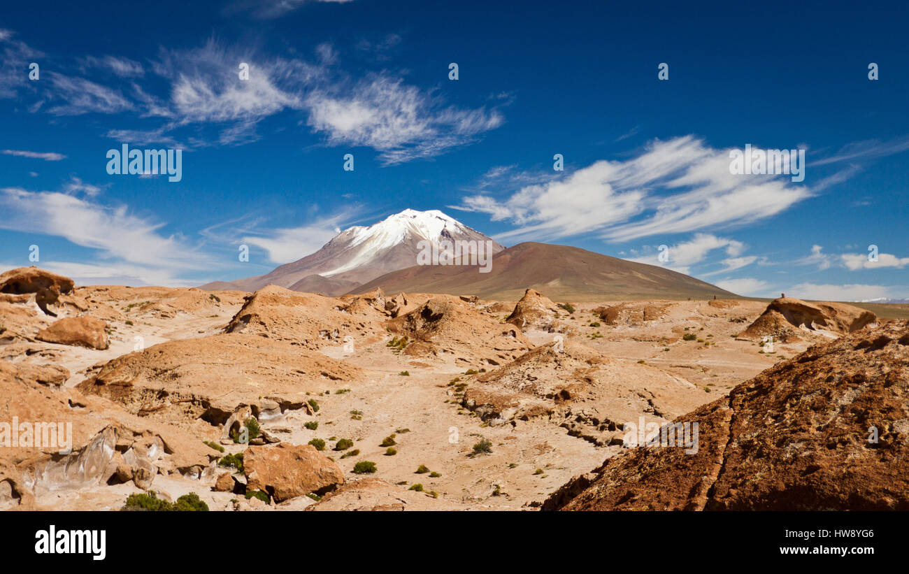 Scenic view of Andes mountain range, rocks and snowy peak on background ...