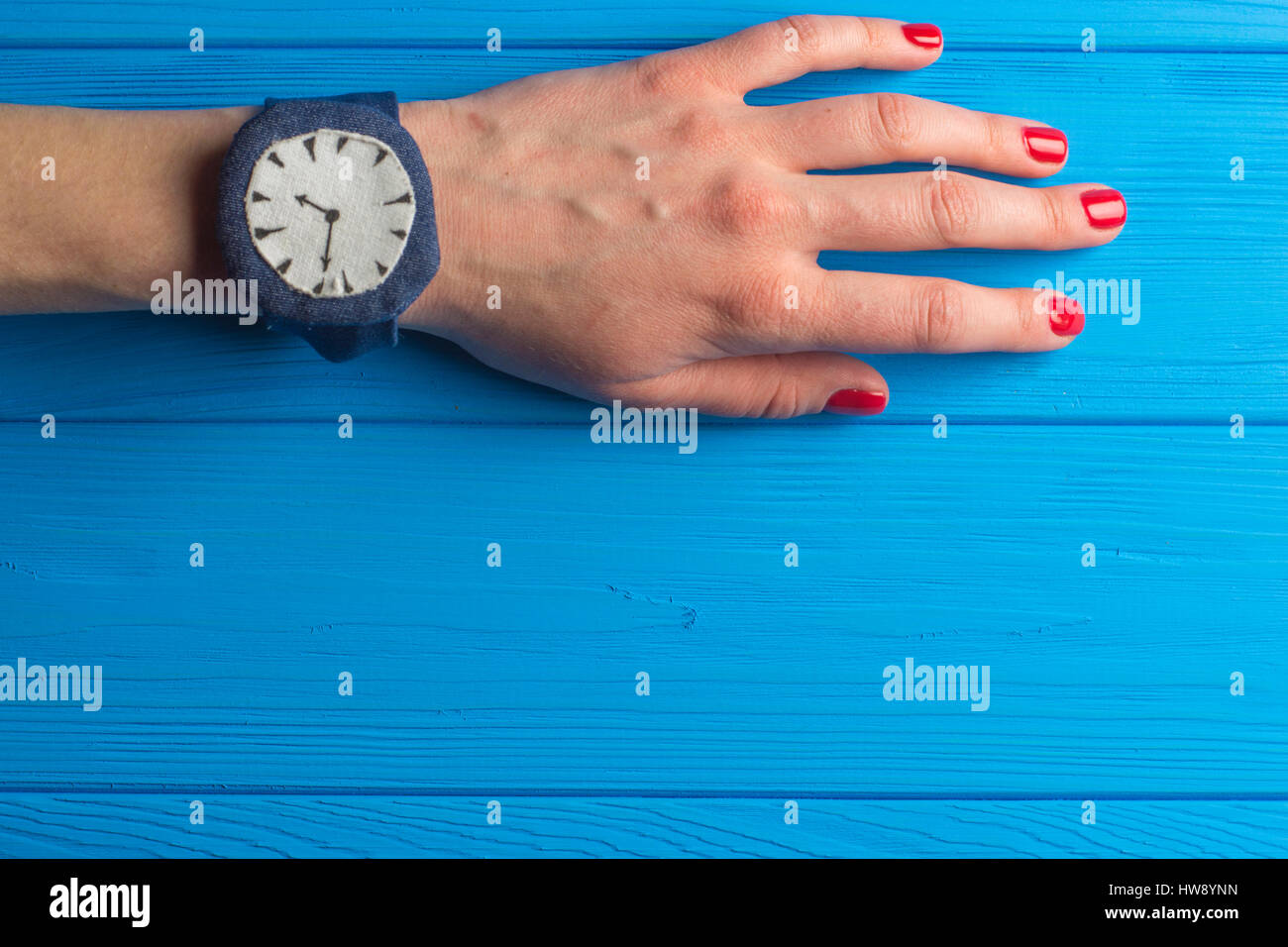 Hand with watch hi-res stock photography and images - Alamy