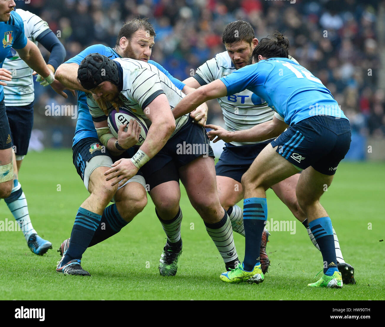 Scotland's Zander Fagerson is held by Italy's Lorenzo Cittadini and ...
