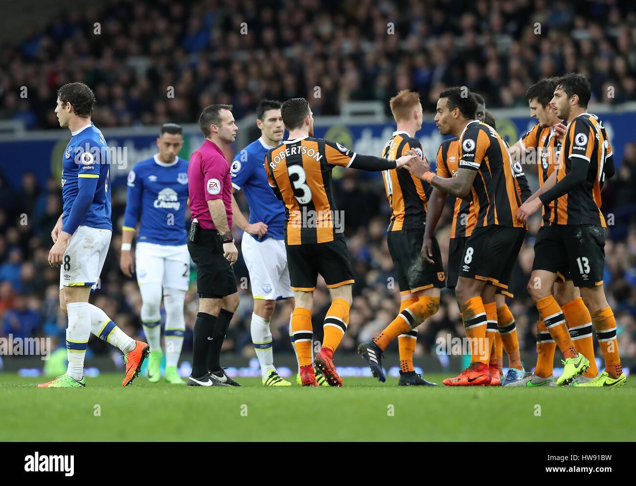 Hull City's Tom Huddlestone (second right) is surrounded after being ...