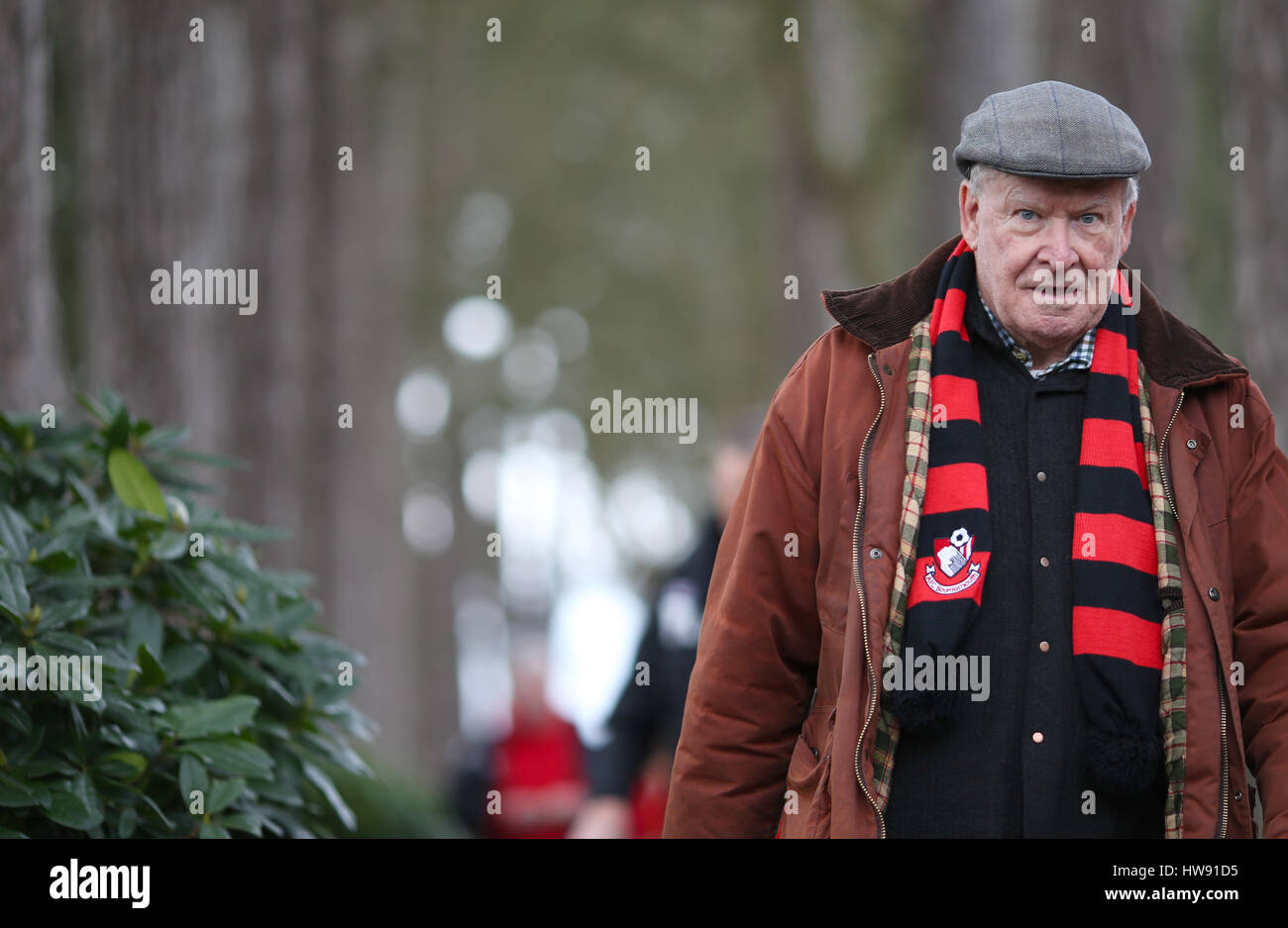 An AFC Bournemouth fan arriving for the Premier League match at the ...