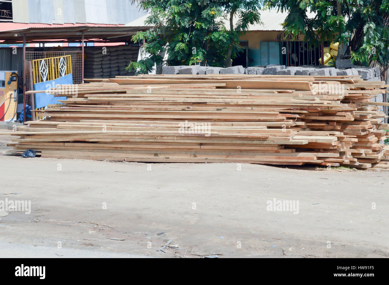 Pile of planks planted along the road from Nairobi to Mombassa in ...