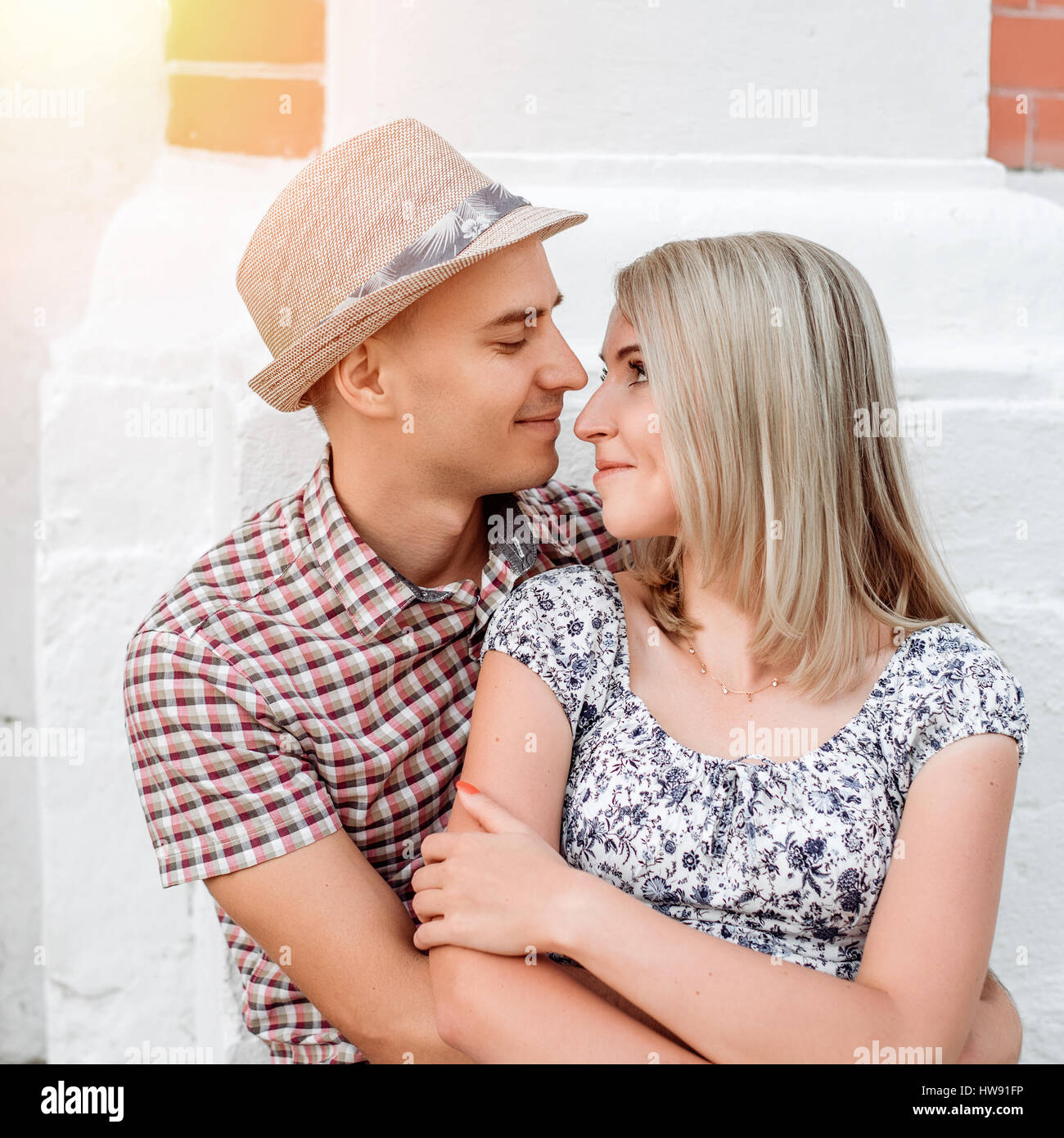 Close-up, a young modern couple in city, in summer relationship of ...