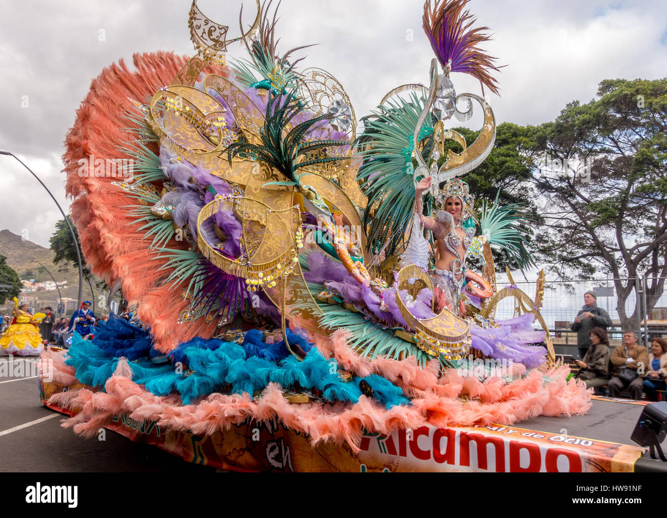 Woman in elaborate costume on enormous decorated float in Tenerife ...