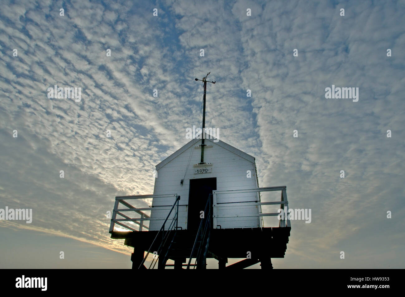 White isolated safe house on a deserted beach on the island Vlieland ...