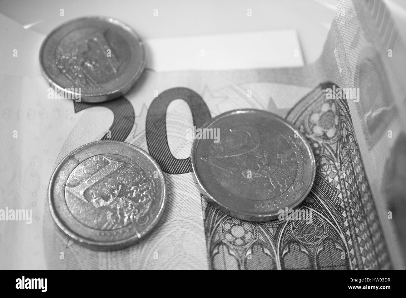 Banknotes and euros on plate Stock Photo - Alamy
